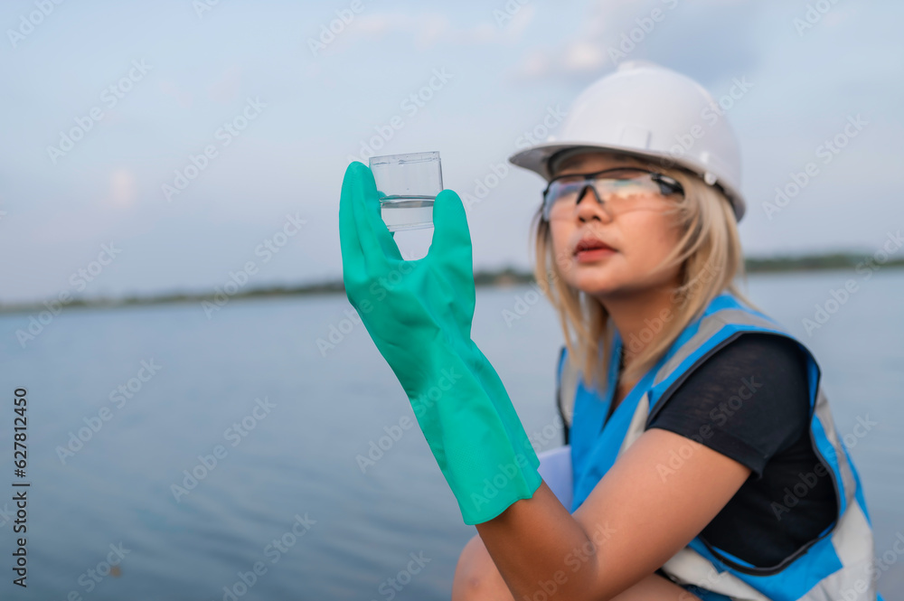 Environmental engineers inspect water quality,Bring water to the lab ...