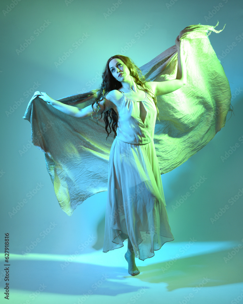 Full length portrait of beautiful brunette woman dancer, wearing ...