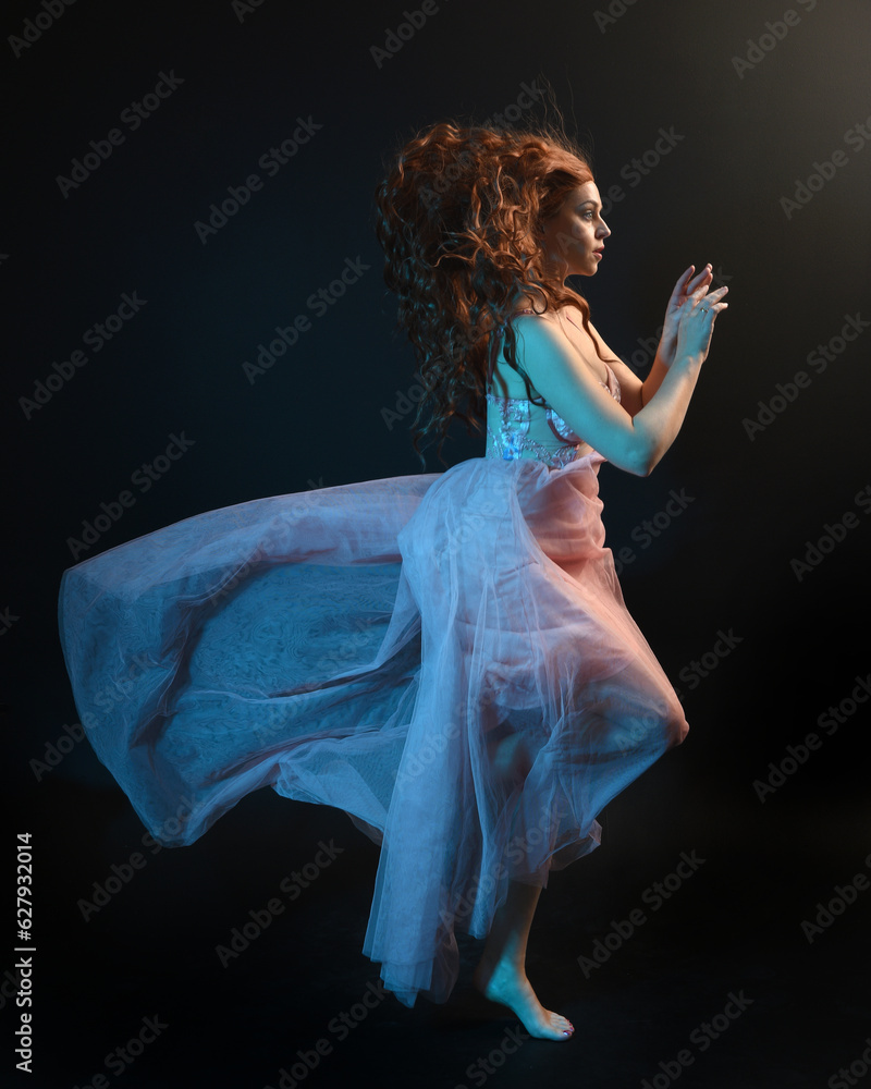 Full length portrait of beautiful brunette woman dancer, wearing ...