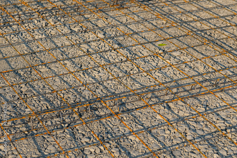 Welded wire mesh, WWM, installed within a sidewalk concrete form prior ...