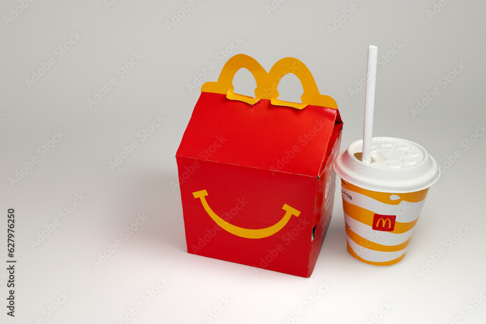 Mcdonald Happy meal with smile on white background. McDonalds kids ...