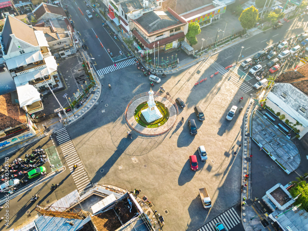 Aerial view of Tugu Jogja or Tugu Pal with crowded vehicles traffic in ...