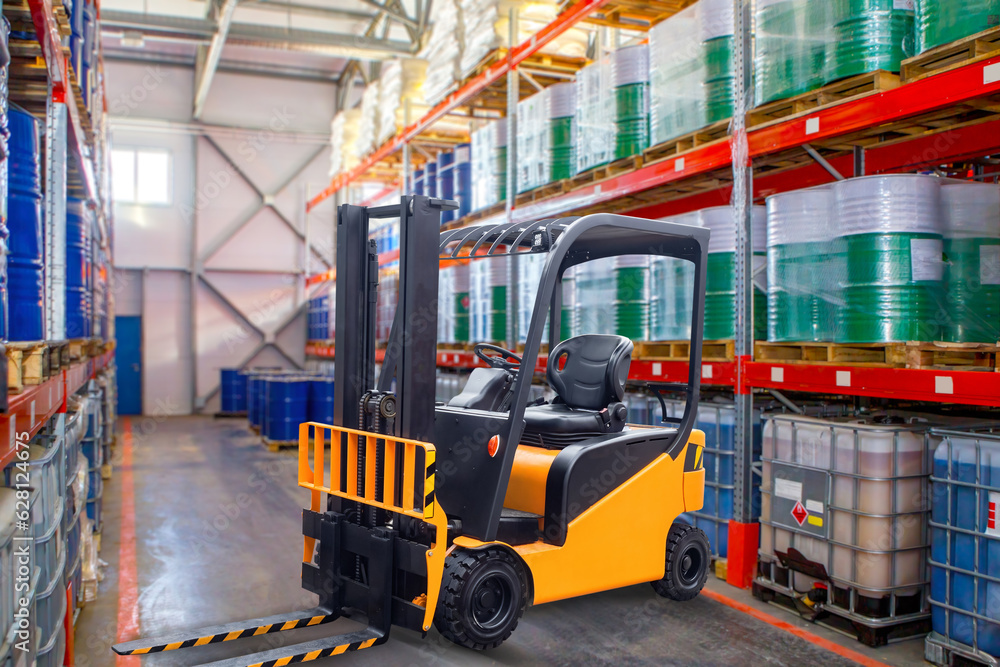 Forklift in stock. Logistics center. Forklift among storage racks ...
