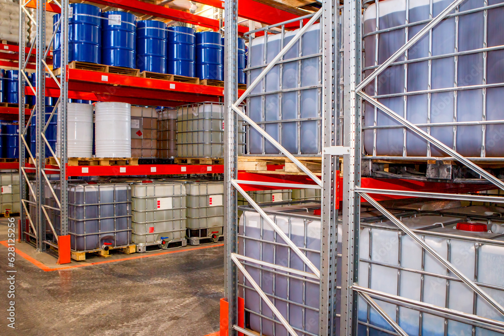 Warehouse business. Warehouse for chemical products. Plastic barrels ...