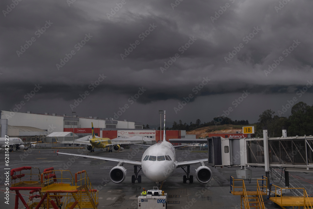 Latam passenger plane connected to the gate with sleeve at the Jose ...