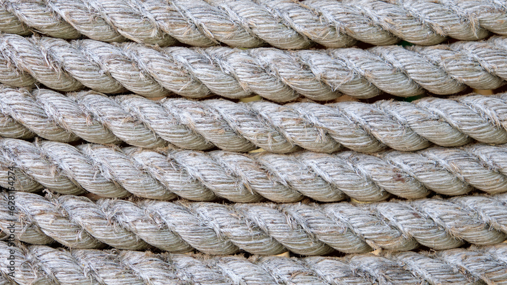 seamless tied rope in a row in parallel line background in closeup ...