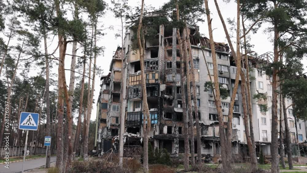 Artillery shell, Rocket hit, Scorched house. Rocket's impact led to ...