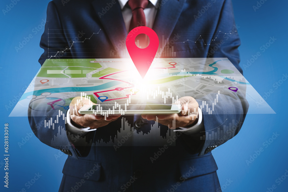Businessman with tablet computer using virtual screen with digital city ...