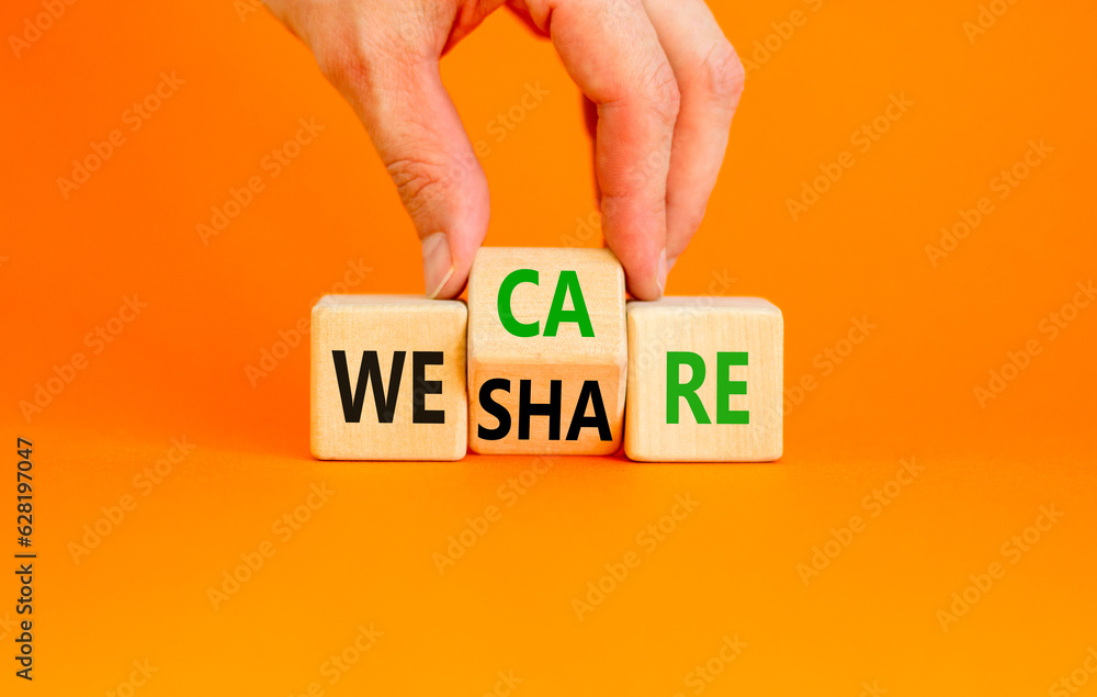 We share and care symbol. Concept word we share we care on wooden block ...