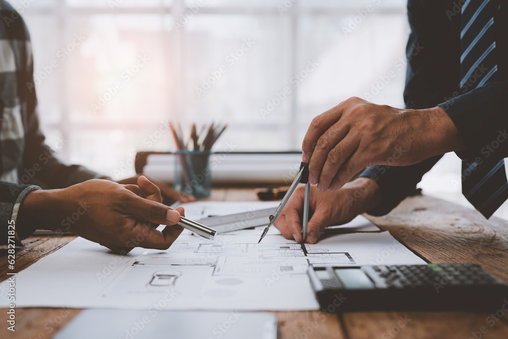 Structural engineer team discussing and calculating work Office design ...