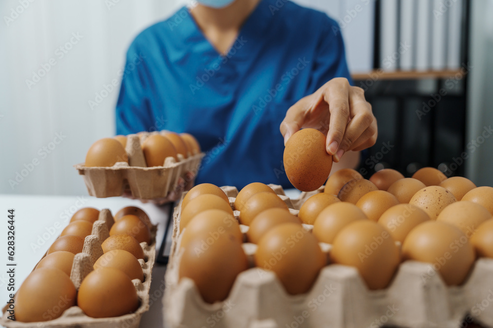 Lab test worker Quality control - Optimum Chicken Egg Quality ...