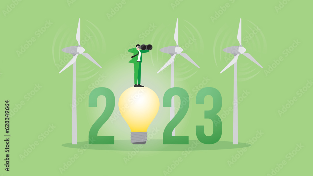 Green energy concept. Vision businessman uses binoculars on 2023 and ...