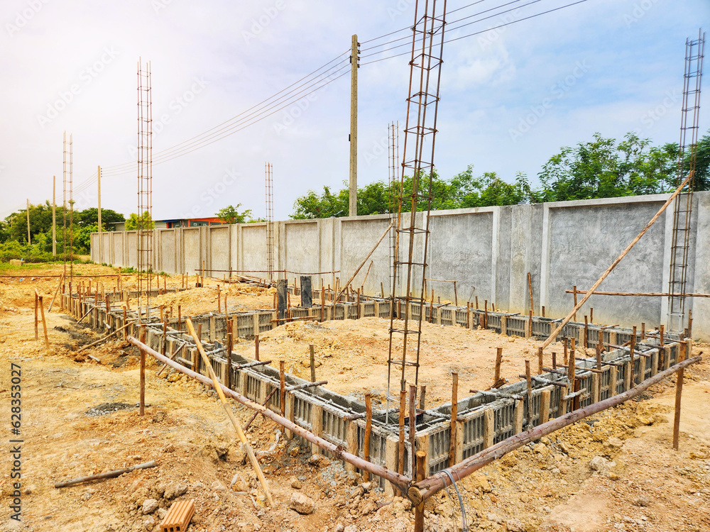 Foundation construction of house in construction site on land, construction, development ...