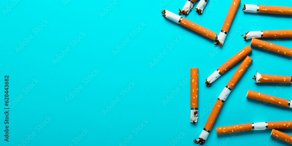 Cigarette on the ground. smoking and smoking concept. Respect for the ...