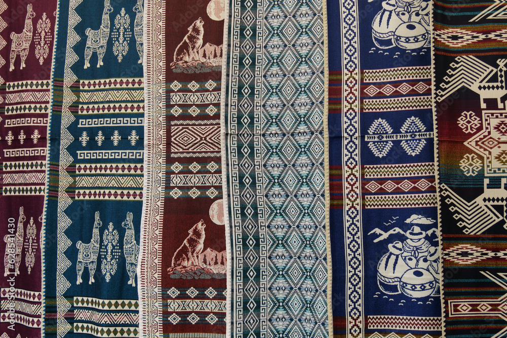 Colorful woven traditional fabric with inca designs for sale at Otavalo ...