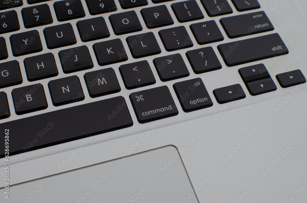 Detailed zoom of laptop keys and keyboard, showing its ergonomics and ...