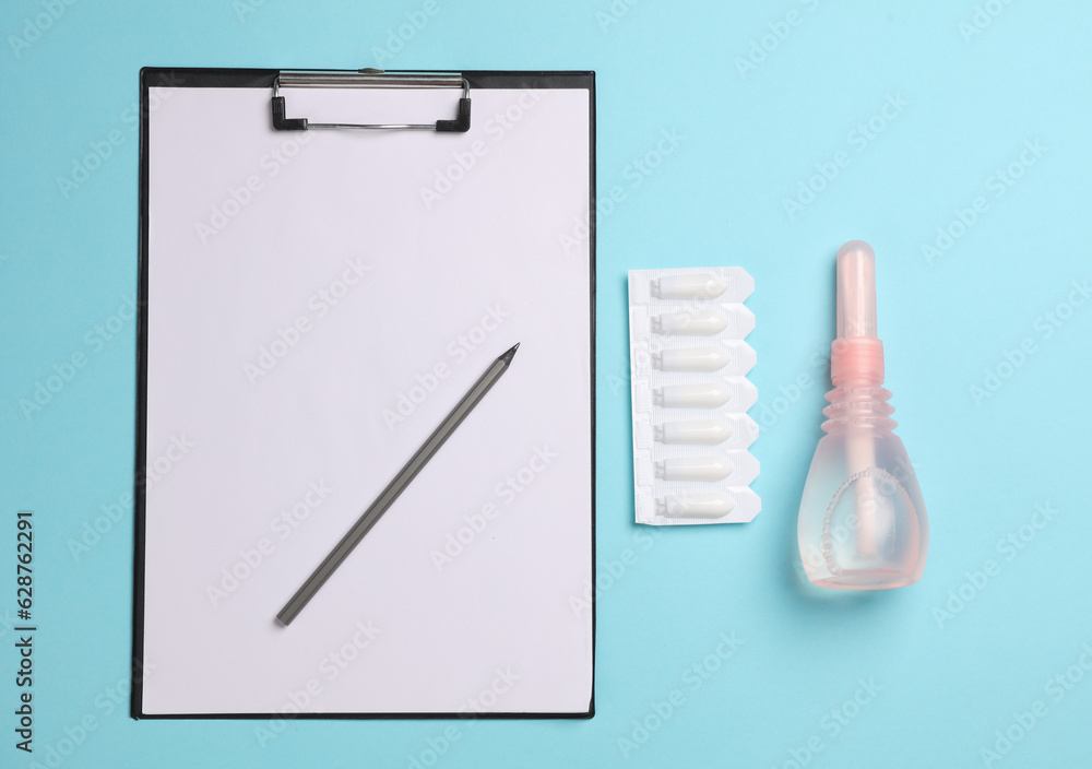 Visit to the gynecologist, Women's health. Clipboard, vaginal enemas ...