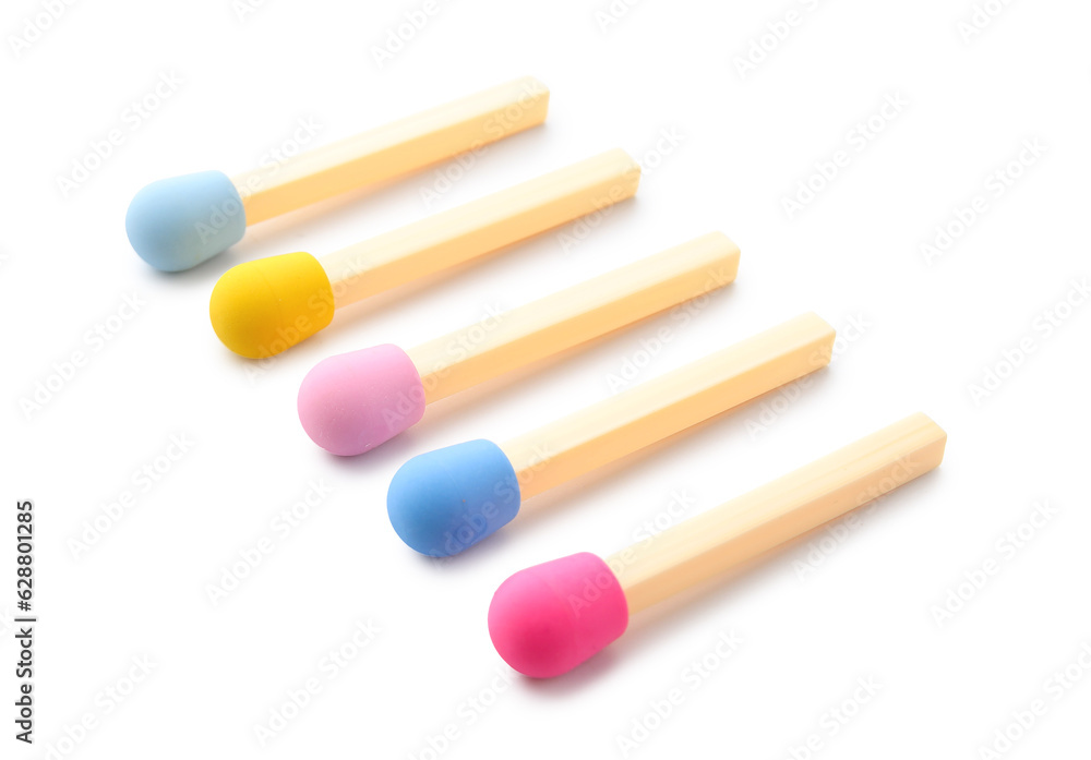 Set of erasers in shape of colorful matches on white background Stock ...