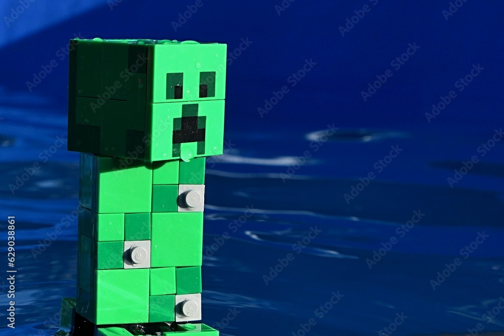 LEGO Minecraft large figure of explosive green Creeper mob swimming in ...
