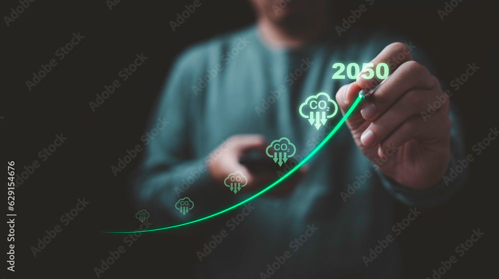 Businessman point to increasing arrow with carbon reduction for for ...