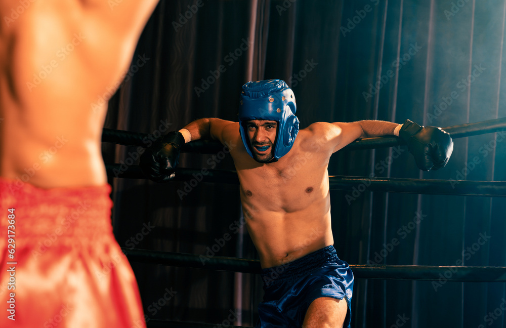 Stockfoto Boxer fighter with boxing helmet in fierce and intense fight ...