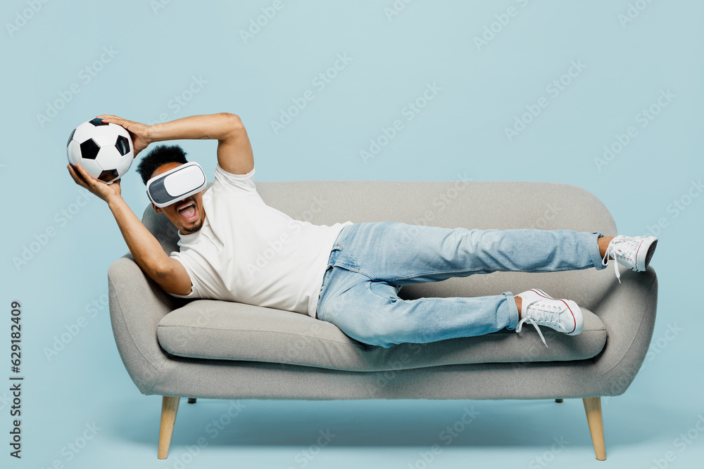 Full body young man fan wearing t-shirt cheer up support football sport ...