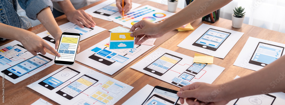 Panorama shot of front-end developer team brainstorming UI and UX ...