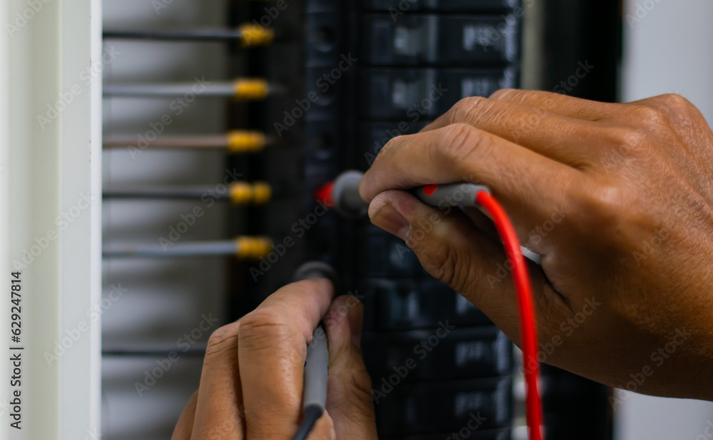 Electrician work tester measuring voltage and current of power electric ...