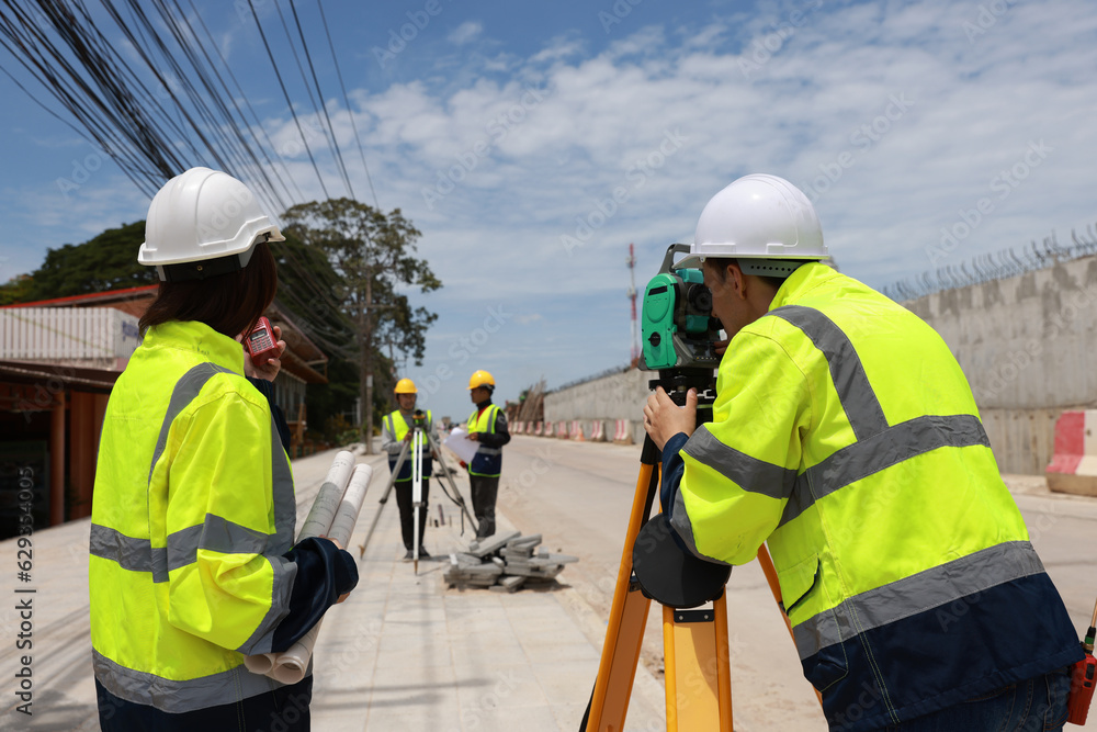 Civil engineers teamwork at road construction sites to supervise new ...