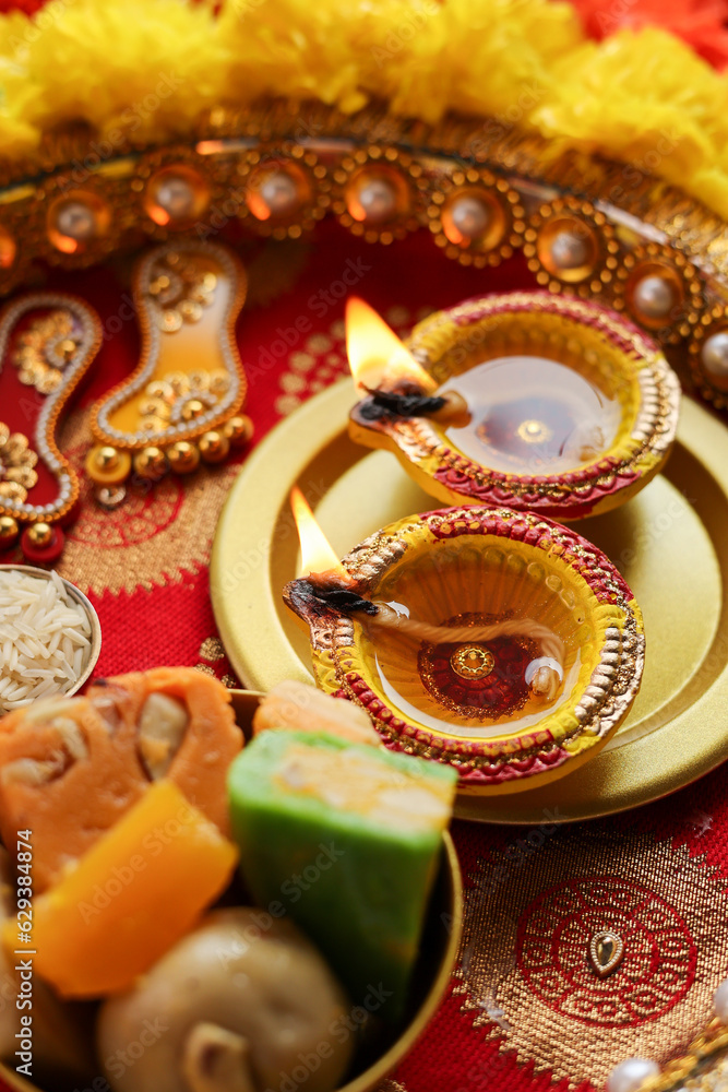 Beautifully Decorated Pooja Thali for festival celebration to worship ...