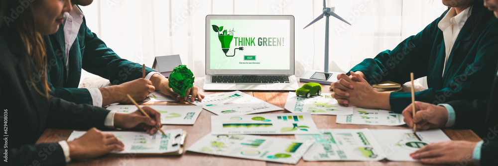 Business people in green corporate company planning eco-friendly and ...