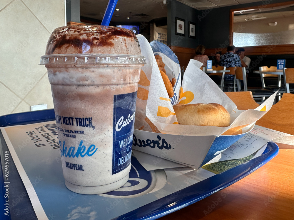 Baldwin, Wisconsin - July 21, 2023: Chocolate milkshake and a burger ...