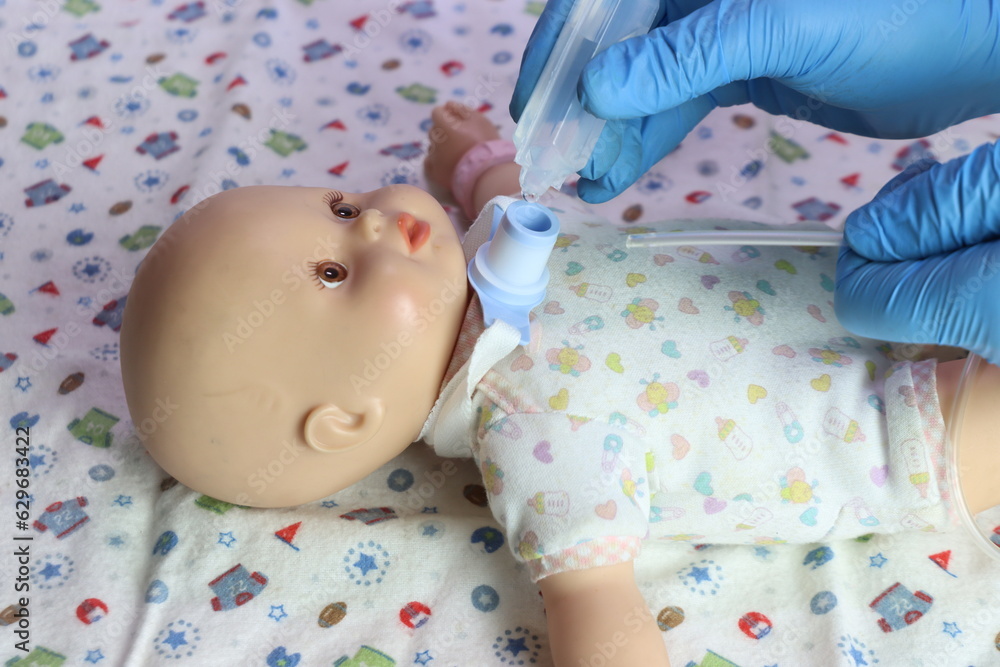 Simulation in a neonatal patient a tracheostomy suction. Health care ...
