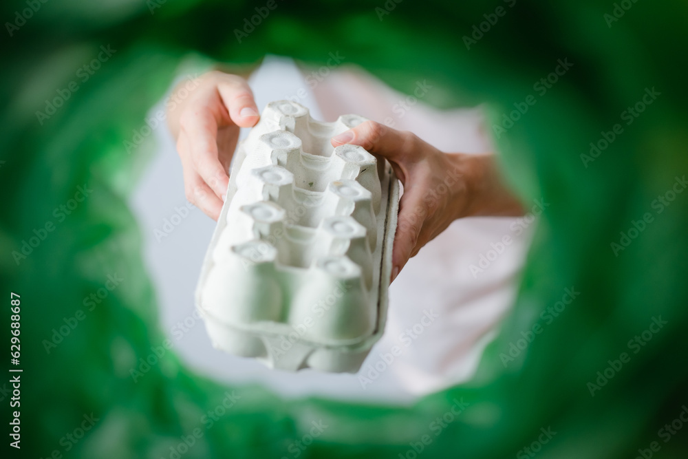 Collecting packaging paper for recycling in bin POV. Waste segregation ...