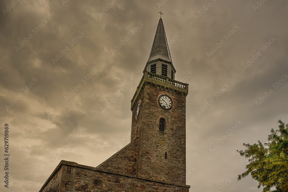 2023-06-11 A OLD BRICK CLOCK TOWER IN INVERNESS SCOTLAND WITH A DARK ...