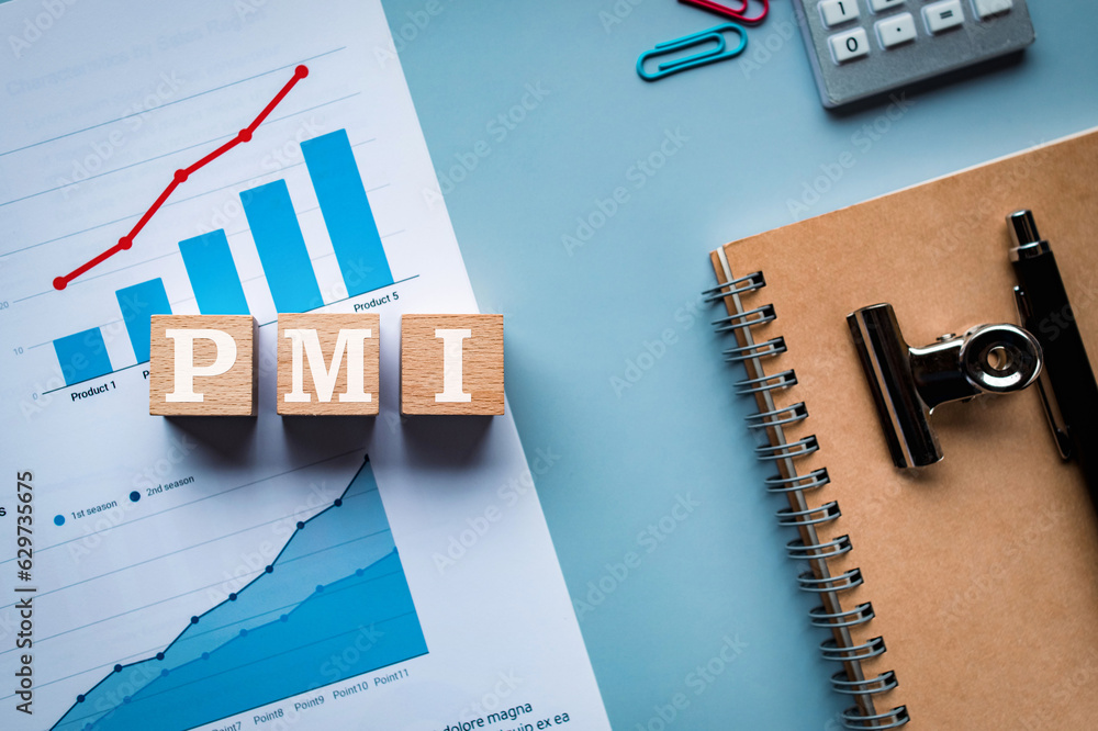 There is wood cube with the word PMI. It is an abbreviation for Post ...