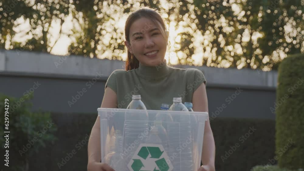 Save the planet reduce CO2 go green people carry bin box at outdoor ...