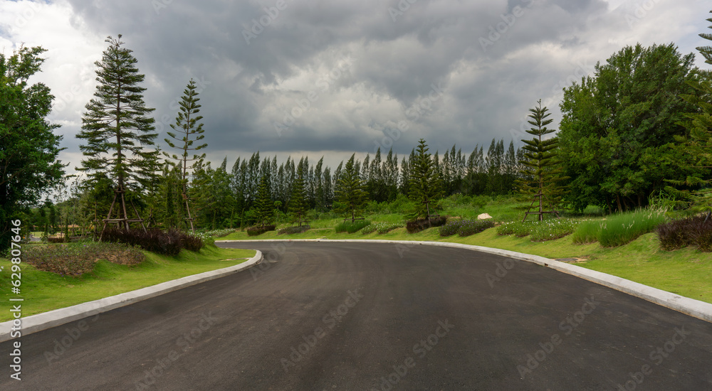 Landscape of curve asphalt road to the mountain in a nature between big ...