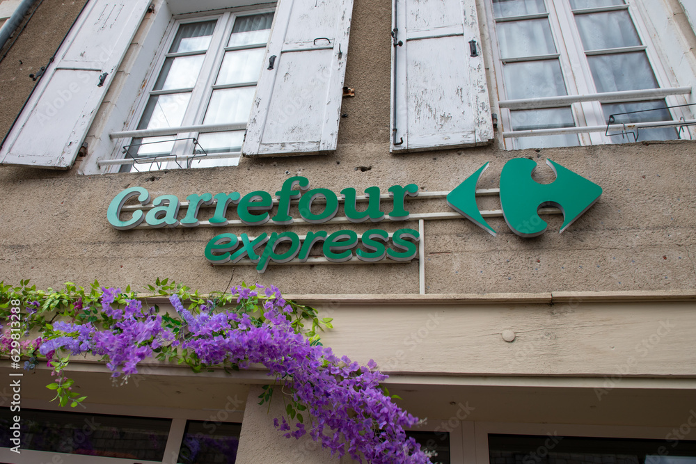Carrefour express logo sign green on facade supermarket french chain ...