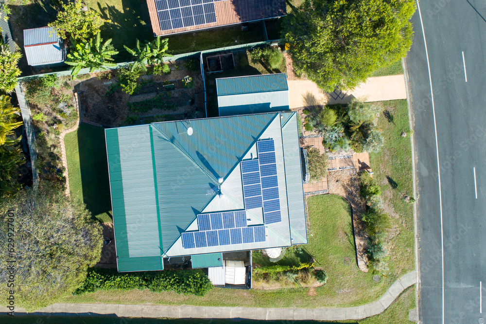 Looking down on Queenslander style house with solar panels. Stock Photo ...