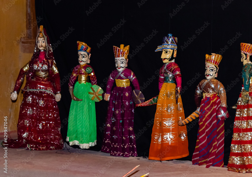 Night time photography of a Puppet show with different characters ...