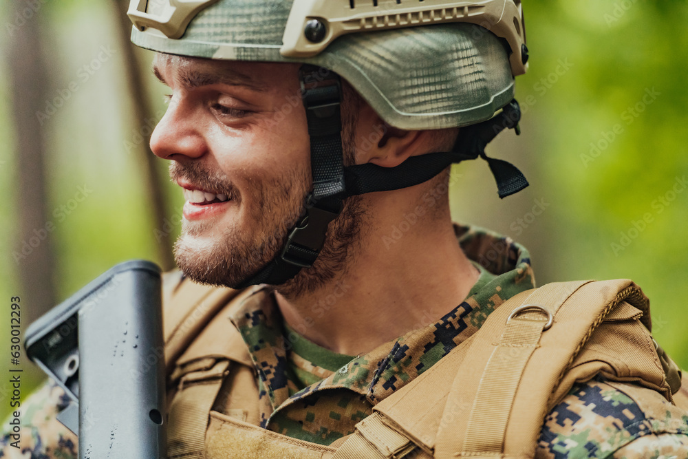 A modern warfare soldier on war duty in dense and dangerous forest ...