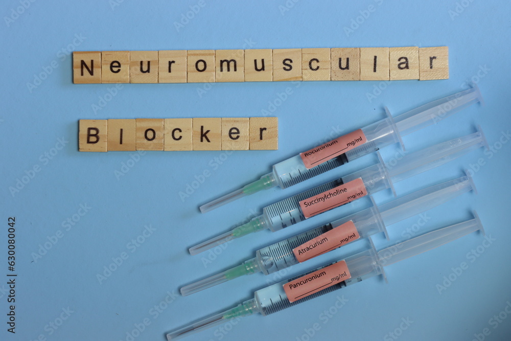 Neuromuscular blocker drugs in different syringes with label in a light ...