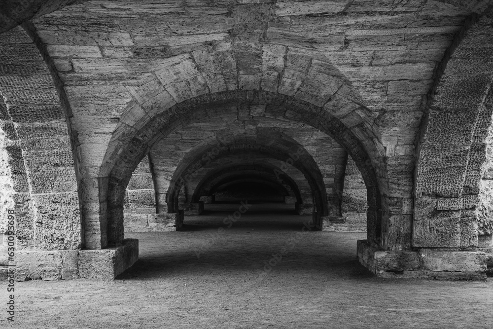 Elements of ancient architecture. Massive supports, heavy arches ...