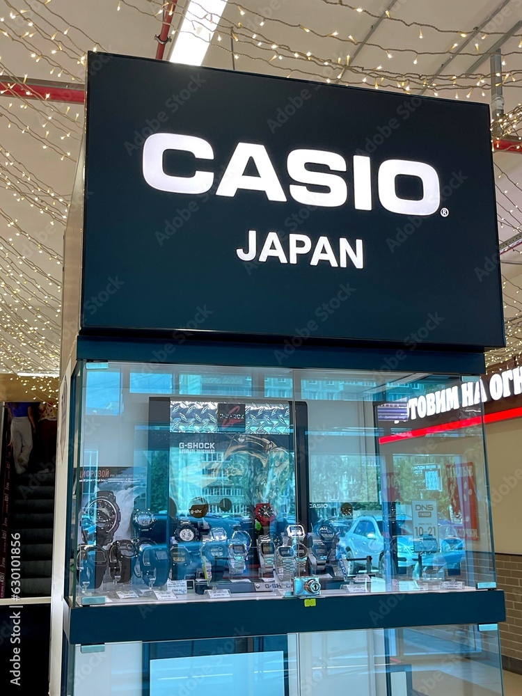 Casio Japan trademark. Tall glass showcase with wristwatches of famous ...