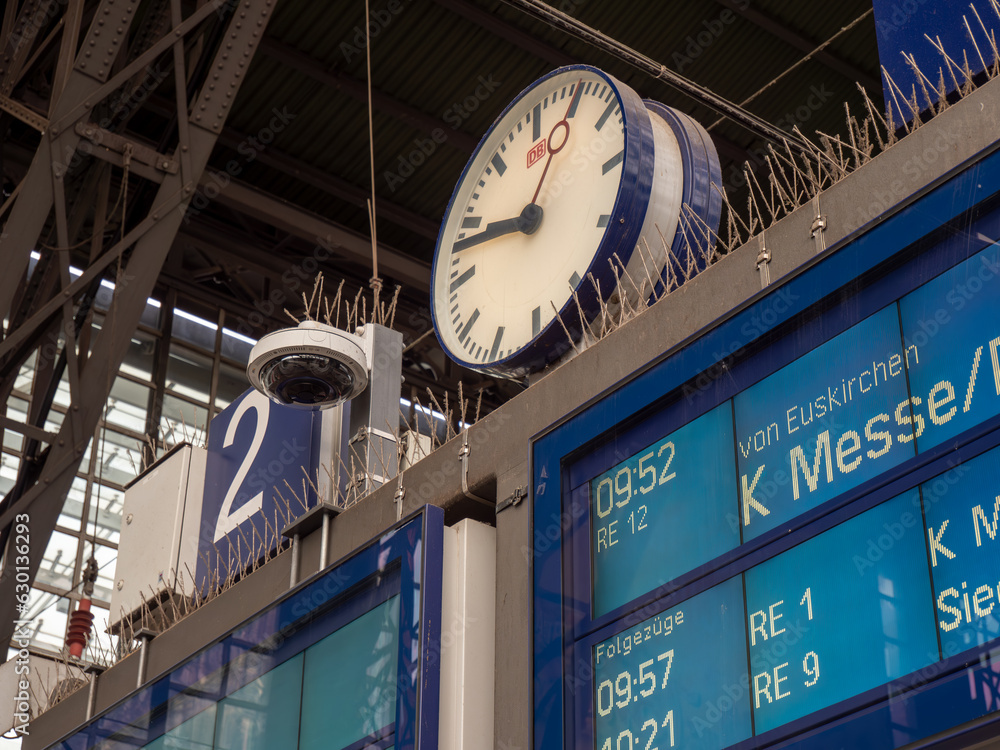 Cologne - AUG 28, 2022: Classic Station Clock, Surveillance Camera, and ...