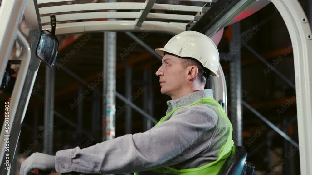 Logistic Guy Caucasian Worker Operating Forklift at Logistic Center ...
