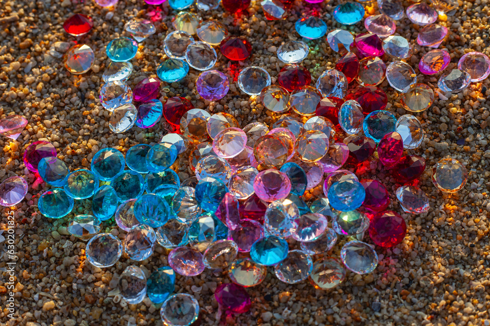 Colorful diamonds on the beach..Each diamond caught the glimmer of the ...