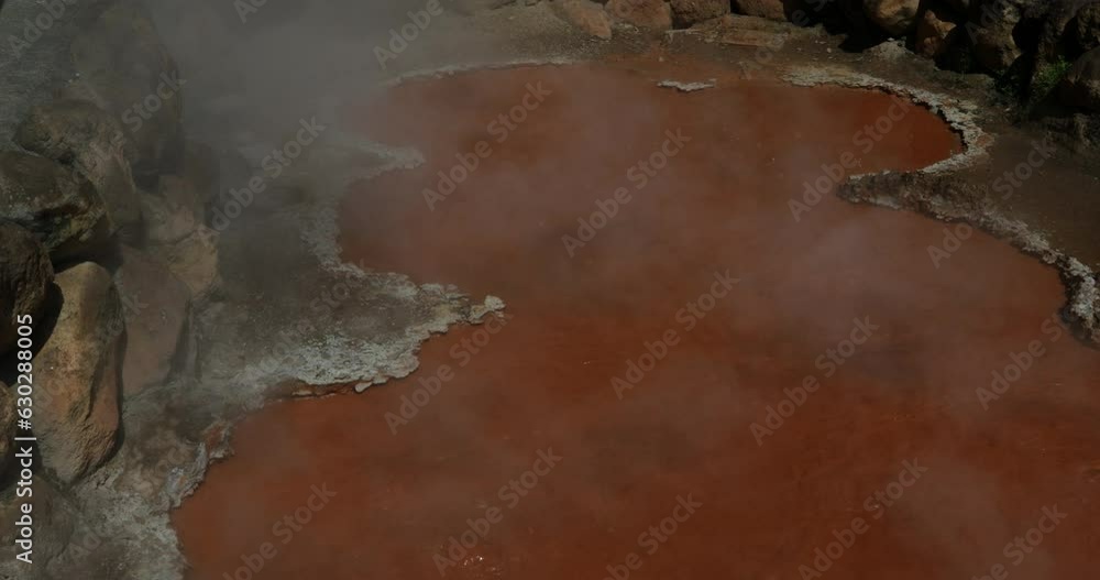Orange thermal mud hell in Kamado jigoku cooking pot hell Beppu Japan ...