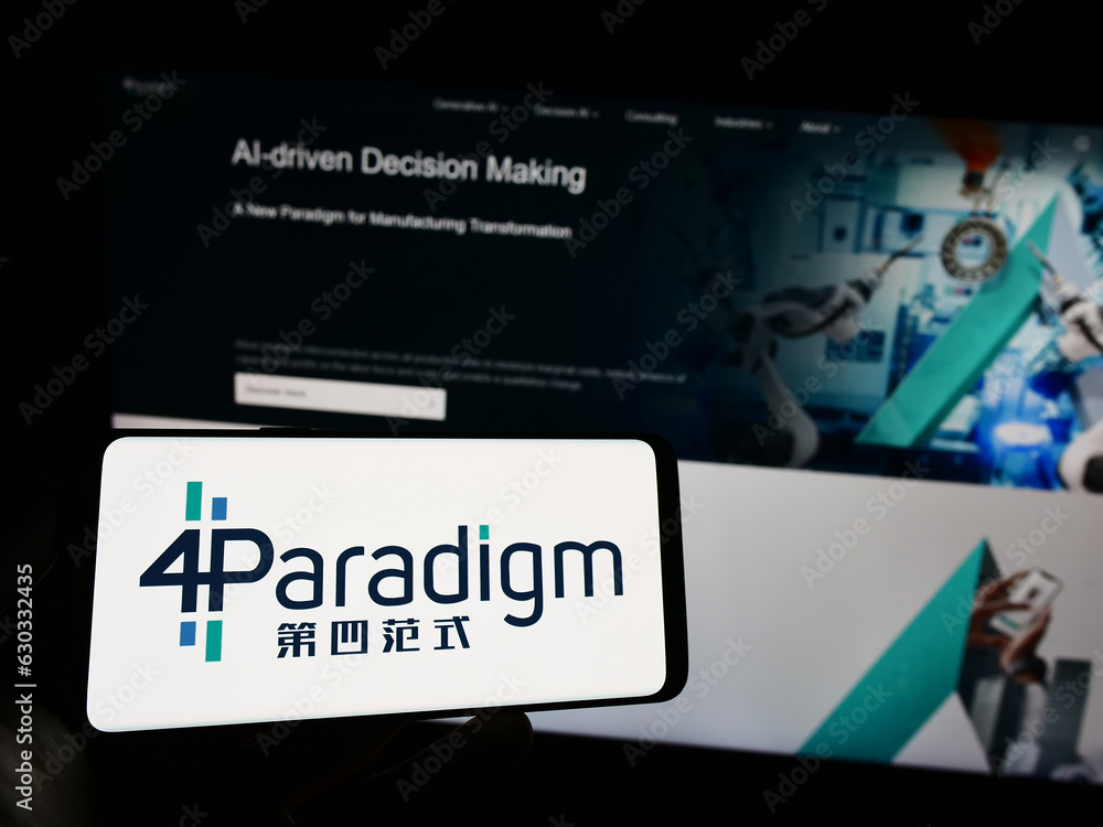 Stuttgart, Germany - 07-27-2023: Person holding mobile phone with logo ...